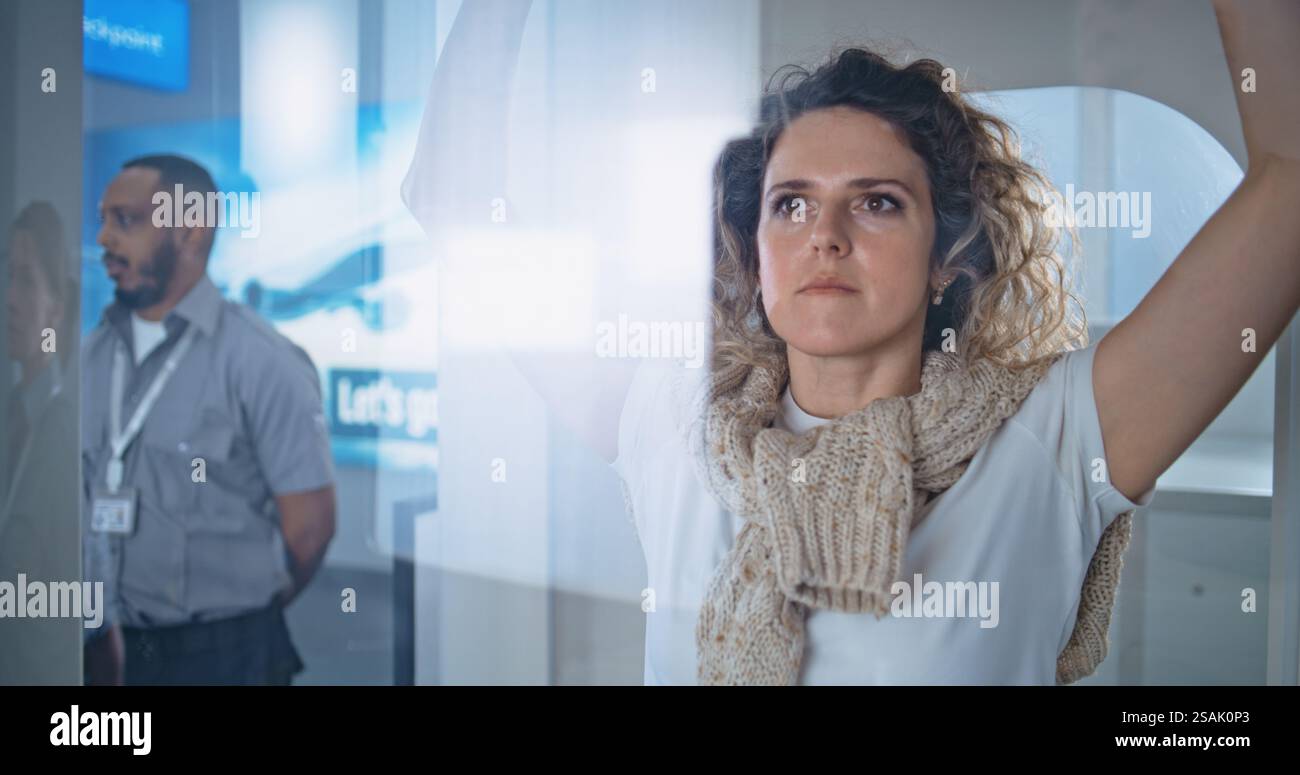 International Airport Terminal: Adult Woman Passes Through Metal ...