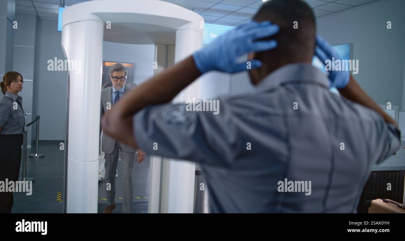 Airport Terminal Security Check: Mature Businessman Passes Through ...