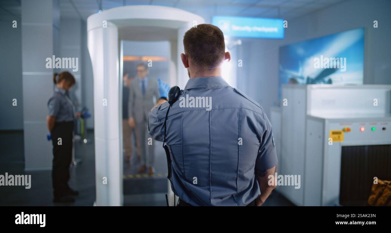 Airport Terminal: Mature Man Walks Through Metal Detector Gates on ...