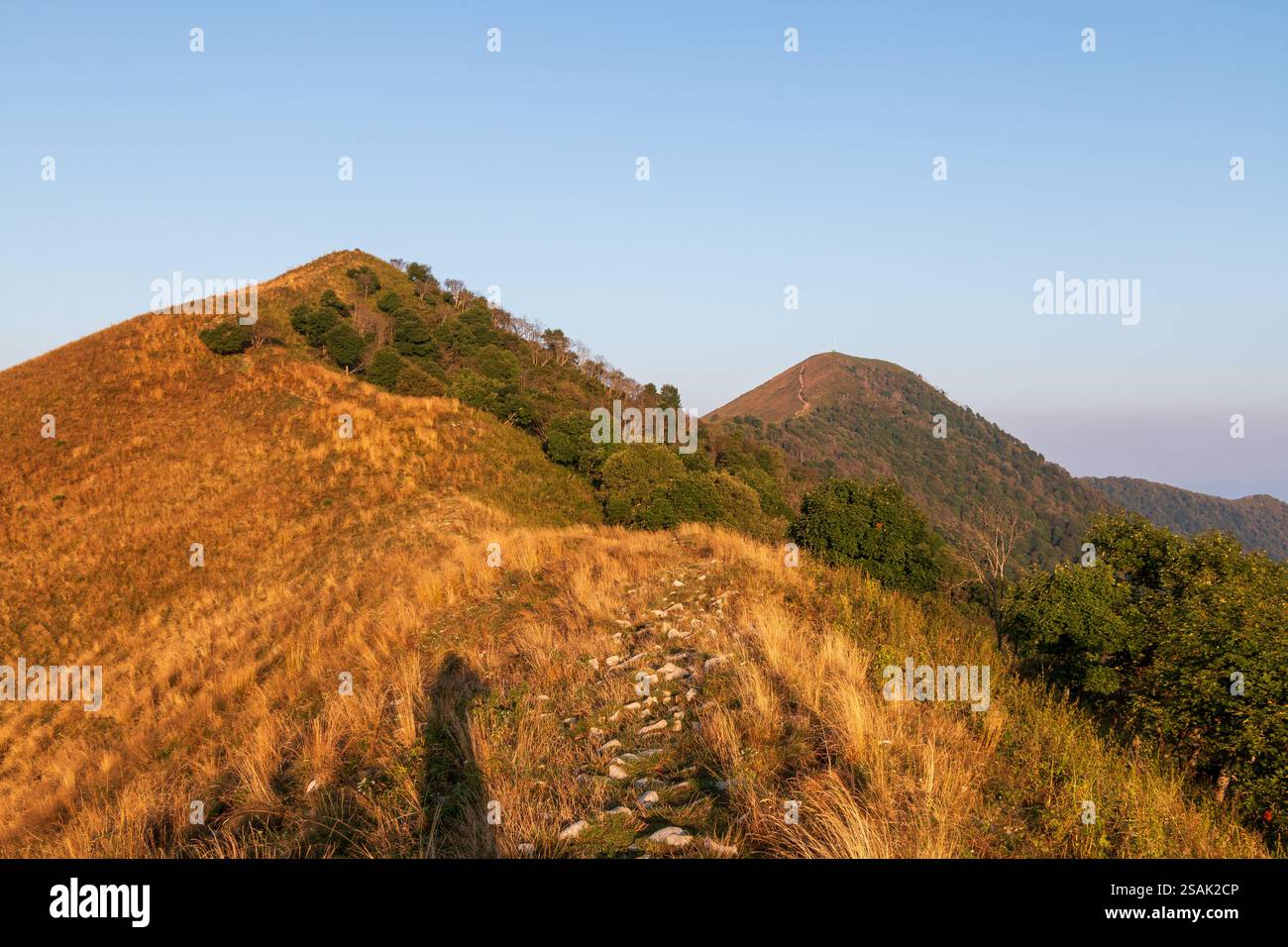 the path that passes along the slope of the mountain and leads to the ...