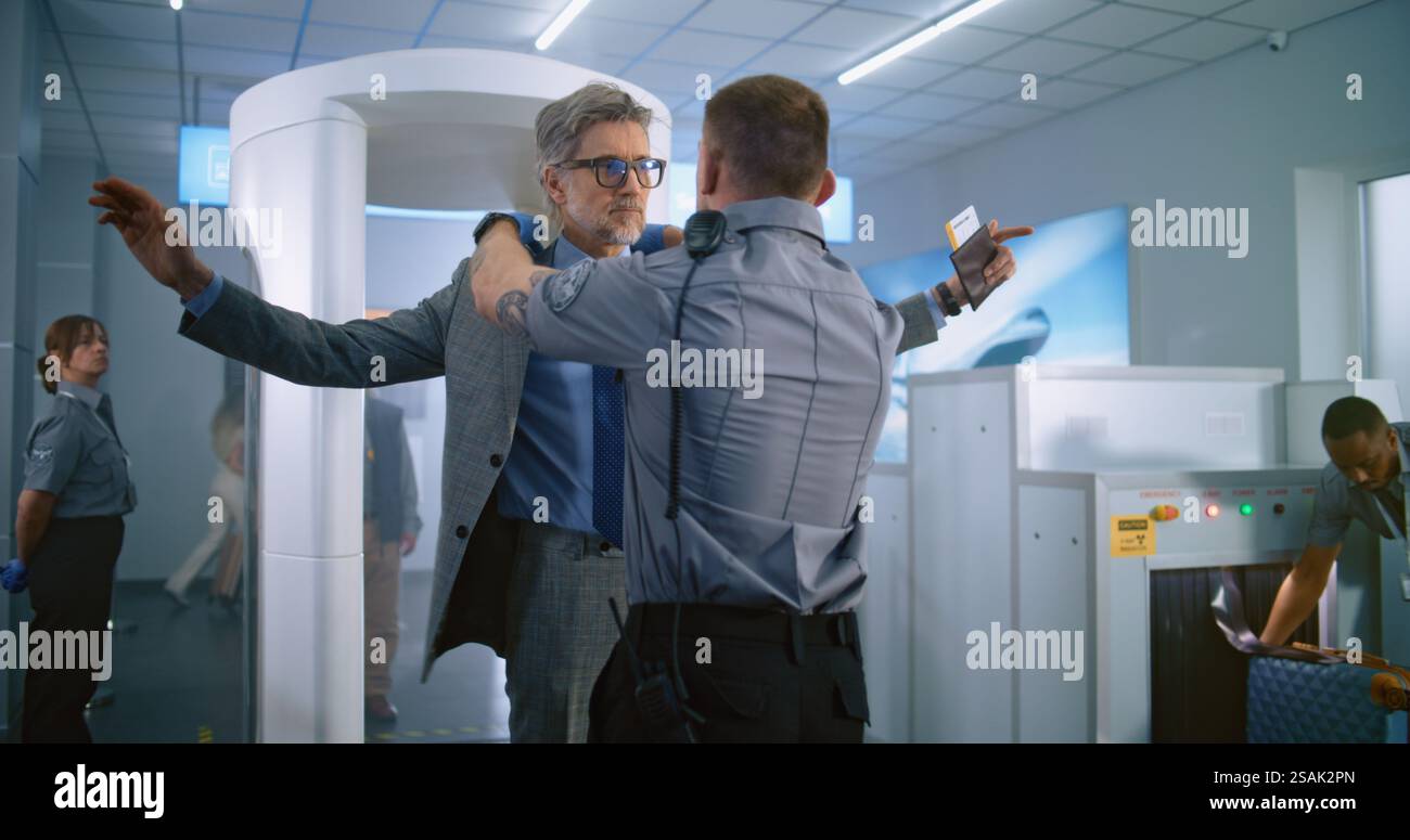 Airport Terminal: Mature Man Passes Through Metal Detector Scanner ...