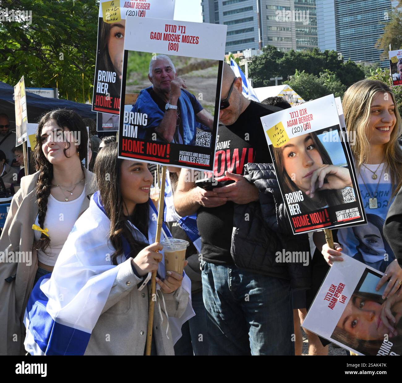 Tel Aviv, Israel. 30th Jan, 2025. People watch on a large screen in ...