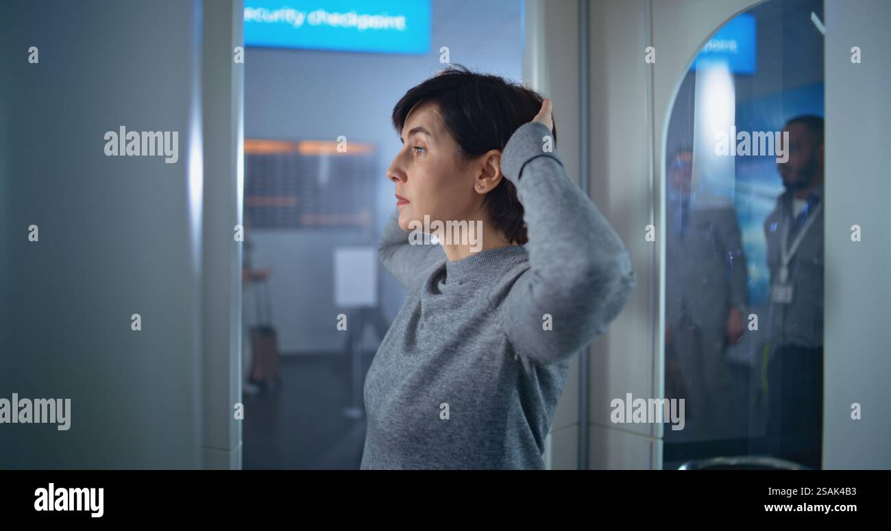 International Airport Terminal: Adult Woman Passes Through Metal ...