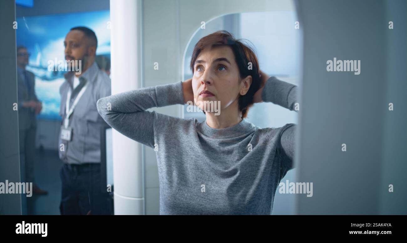 Airport Terminal: Adult Woman Passes Through Metal Detector Scanner on ...