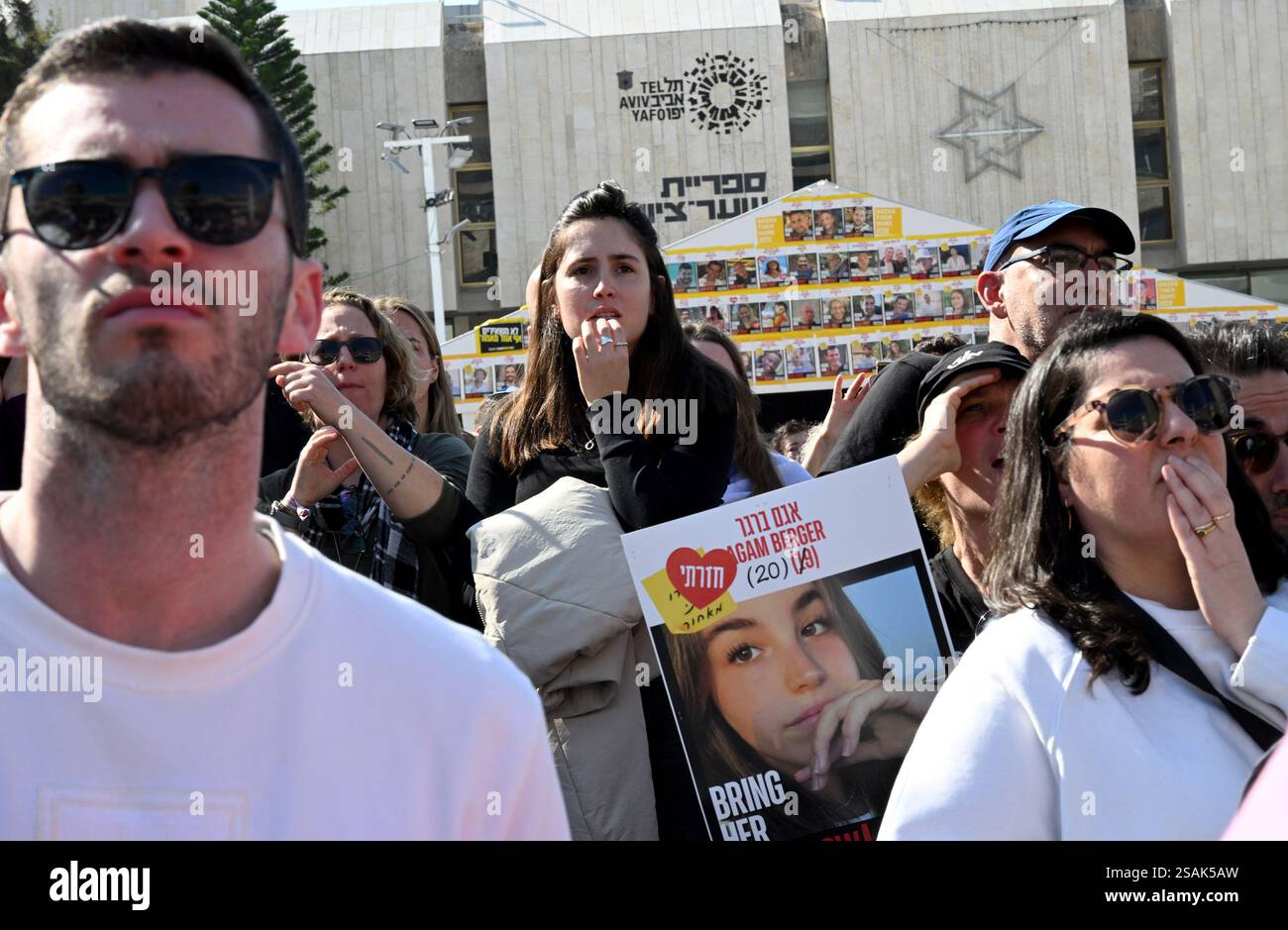 People watch on a large screen in Hostage Square in Tel Aviv, the ...