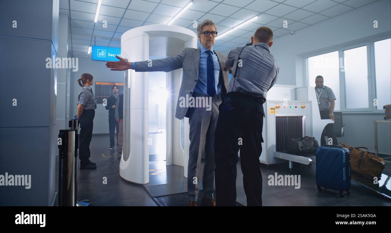 Airport Security Check: Mature Man Passes Through Metal Detector ...