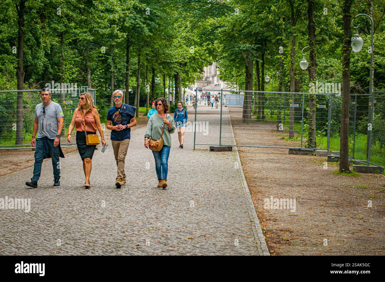 Four adults walking on broadwalk in Berlin, Germany Stock Photo - Alamy
