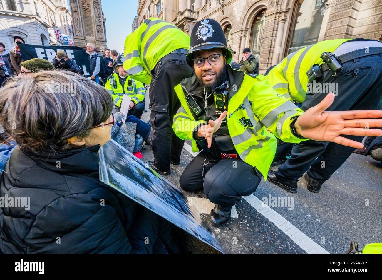 London, UK. 30 Jan 2025. A large group from defend our jurors arrives ...