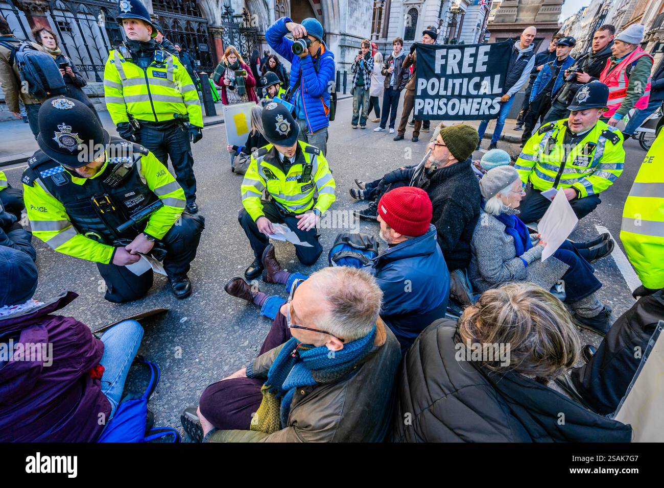 London, UK. 30 Jan 2025. A large group from defend our jurors arrives ...