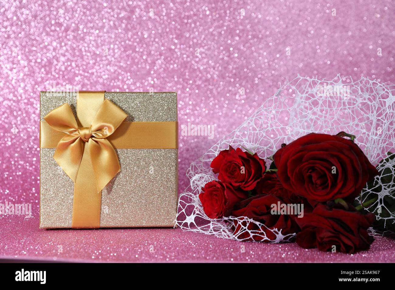 Gift of roses hi-res stock photography and images - Alamy