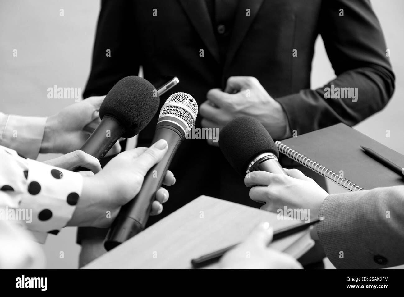 Black male reporter interviewing woman hi-res stock photography and ...