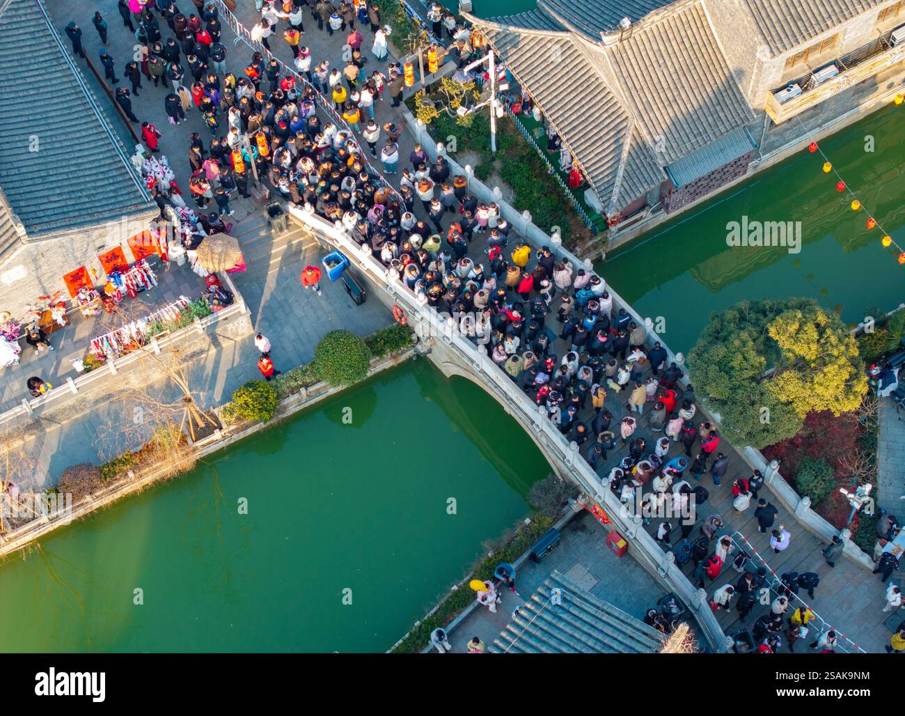 HUAI'AN, CHINA - JANUARY 30, 2025 - Tourists visit the Hexia Ancient ...