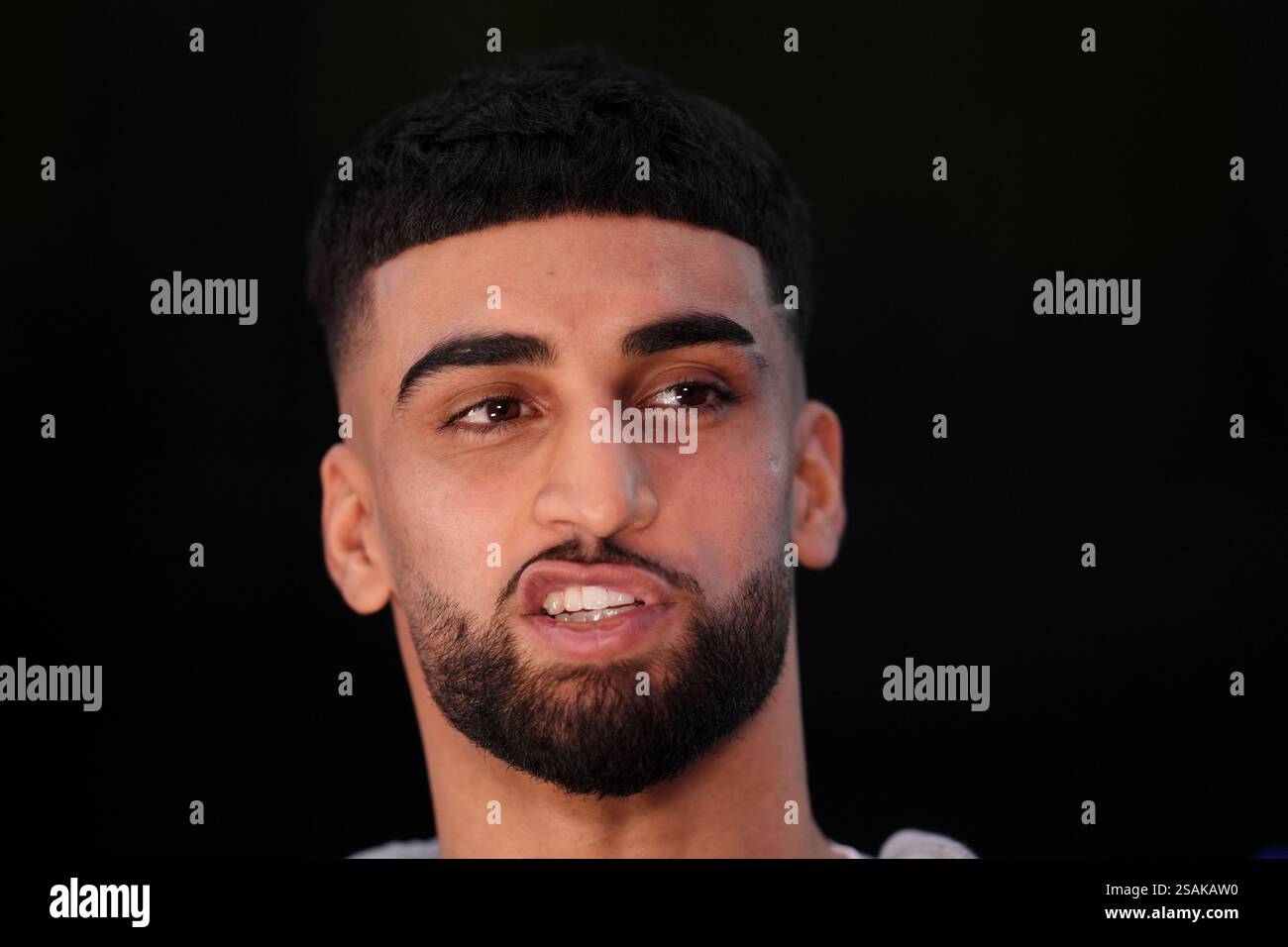 Adam Azim is interviewed following a press conference at BOXPARK ...