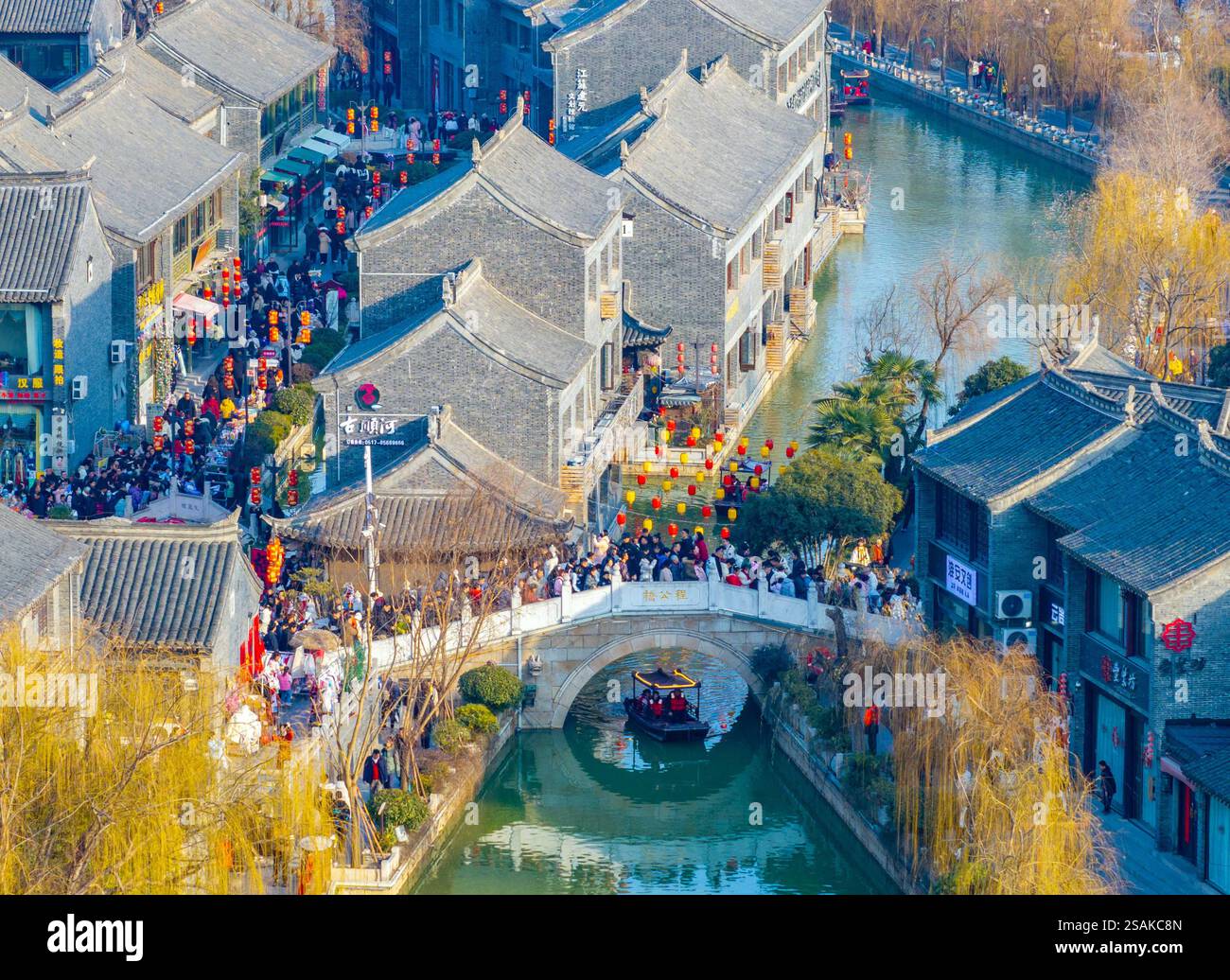 HUAI'AN, CHINA - JANUARY 30, 2025 - Tourists visit the Hexia Ancient ...