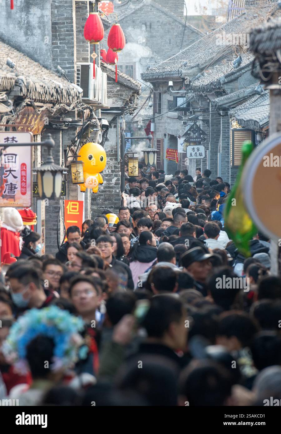 HUAI'AN, CHINA - JANUARY 30, 2025 - Tourists visit the Hexia Ancient ...