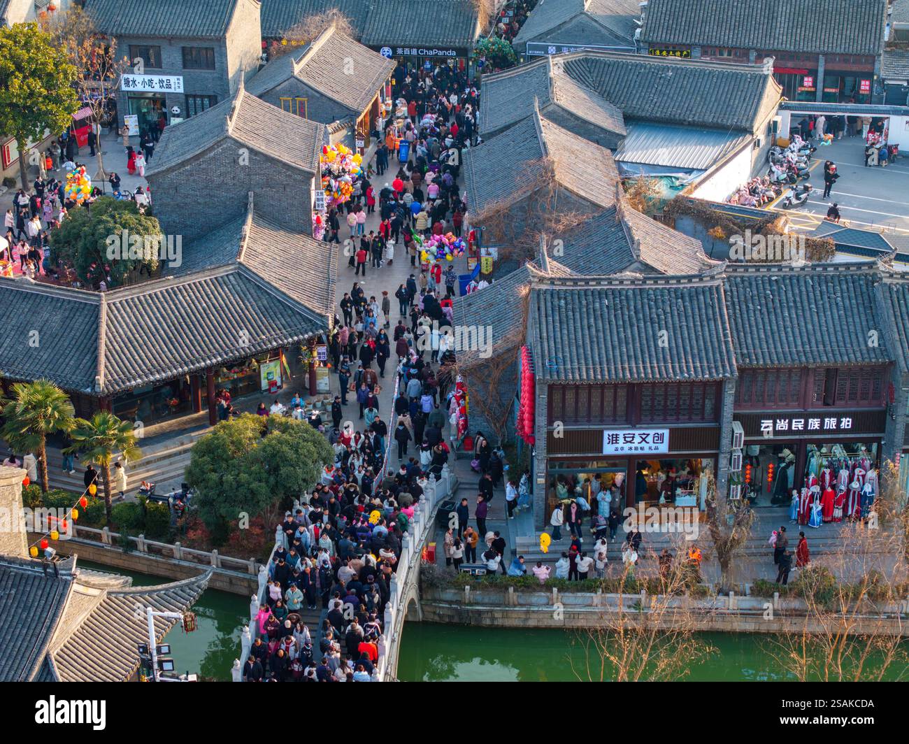 HUAI'AN, CHINA - JANUARY 30, 2025 - Tourists visit the Hexia Ancient ...