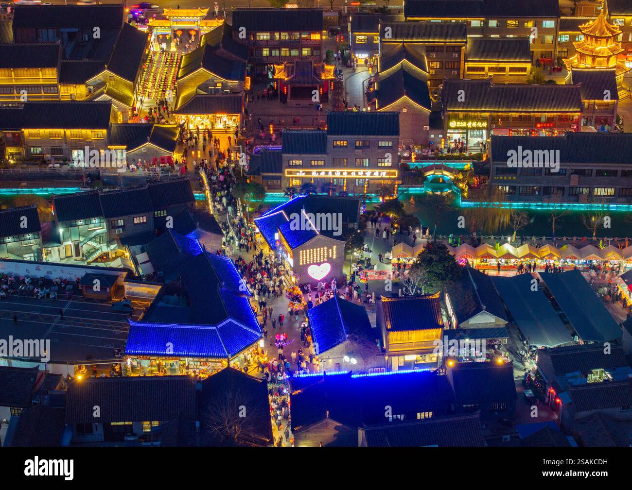 HUAI'AN, CHINA - JANUARY 30, 2025 - Tourists visit the Hexia Ancient ...