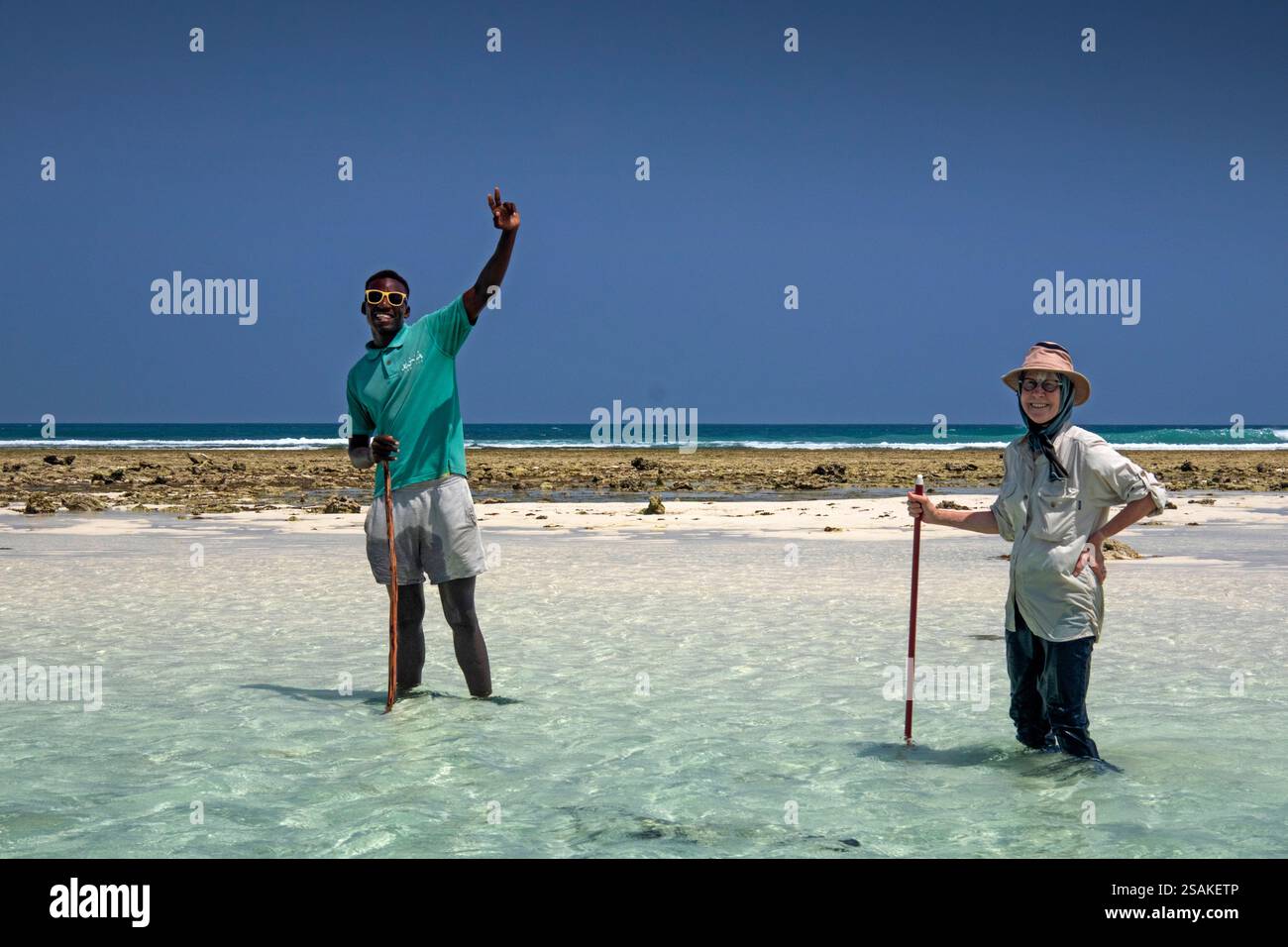 Africa Tanzania, Zanzibar, East Coast, reef walk at low tide, local ...