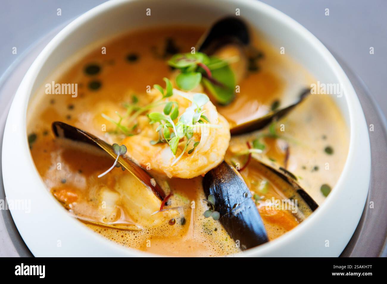 Shrimp Bisque with Seafood. King prawn, blue mussels, cod, whipped ...