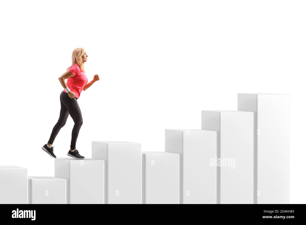 Full length profile shot of a middle aged woman running on rising bar ...