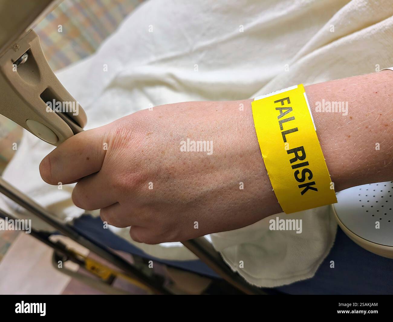 Patient Fall Risk Wristband Close-Up in Hospital Setting Stock Photo ...