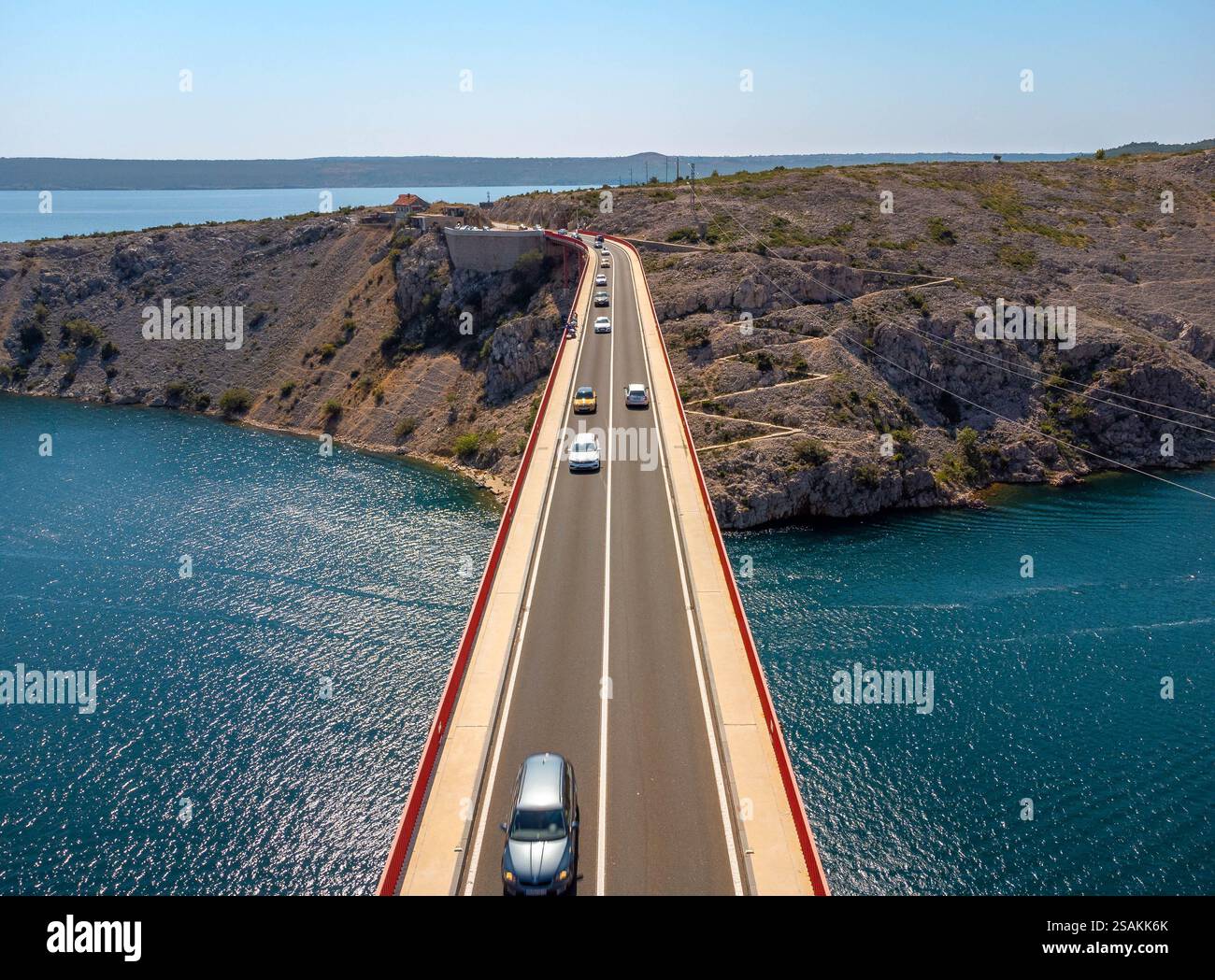 Road photo guideline on a sunny day. Cars on a bridge over the sea, car ...