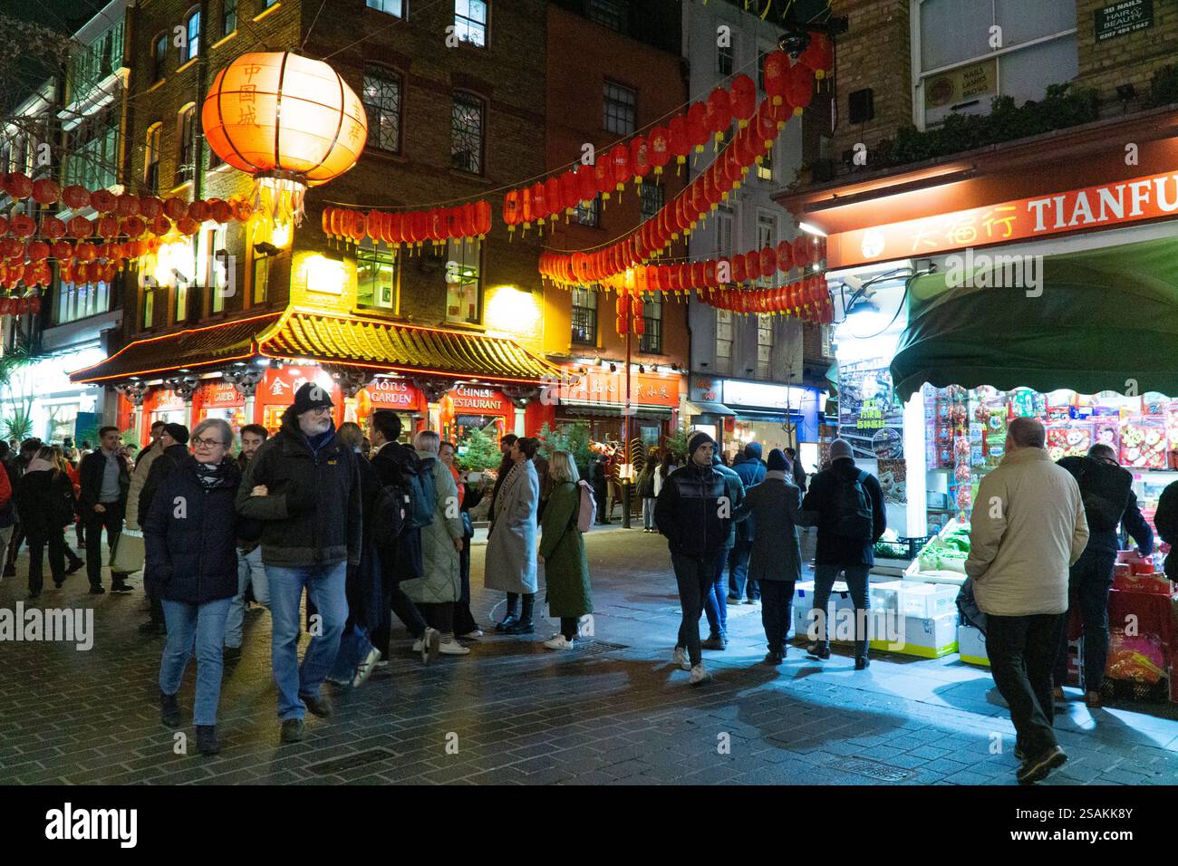 London, UK. 29th Jan, 2025. The shops and restaurants of China Town are busy and the streets ...