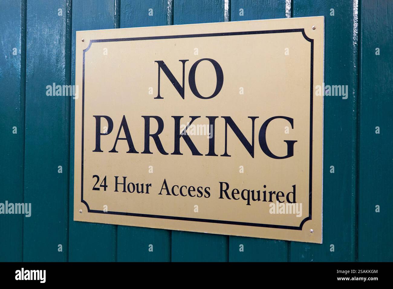 no parking 24 hour access required sign on a gate in belfast, northern ...