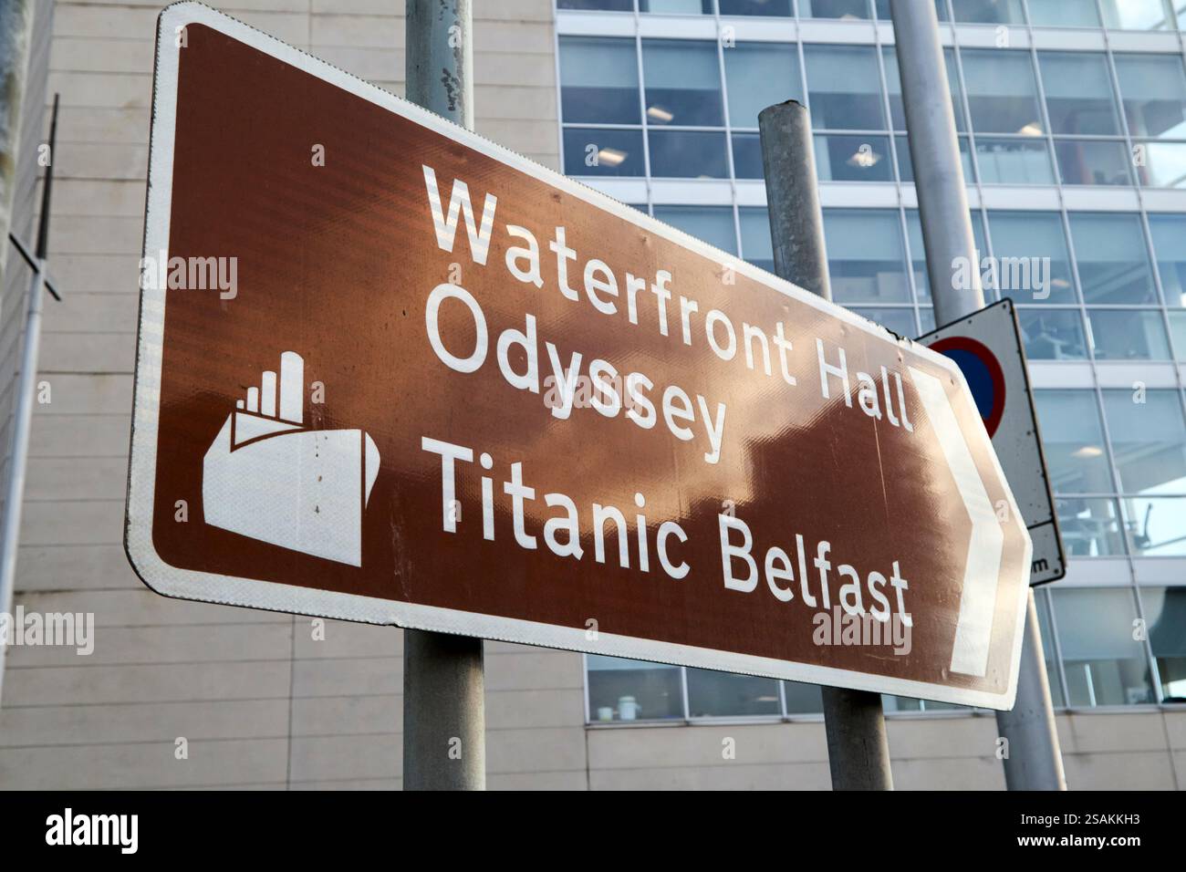 brown tourist direction sign for waterfront hall odyssey and titanic ...