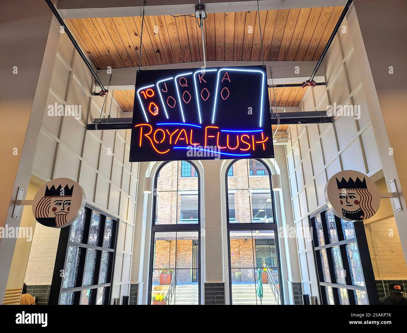 Royal Flush Neon Sign in Modern Bar with King Motifs Eye-Level View ...