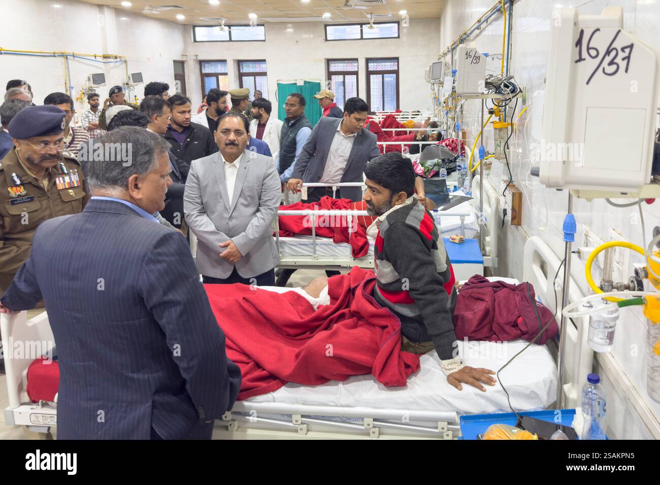 Manoj Kumar Singh, front, chief secretary UP meets an injured person ...