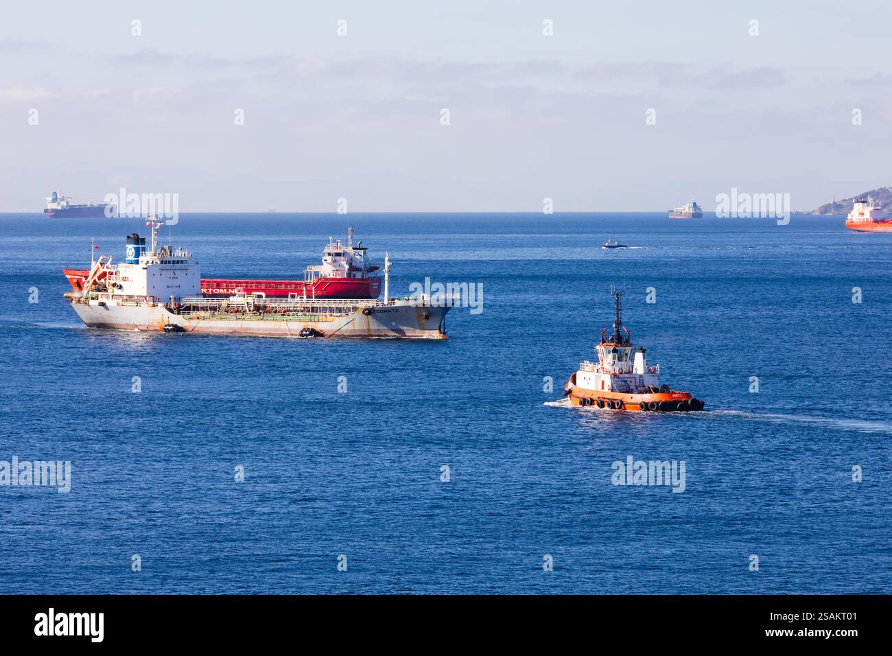 Ecomate bunker fuel tanker in the Bay of Gibraltar, with tugboat Eliott ...