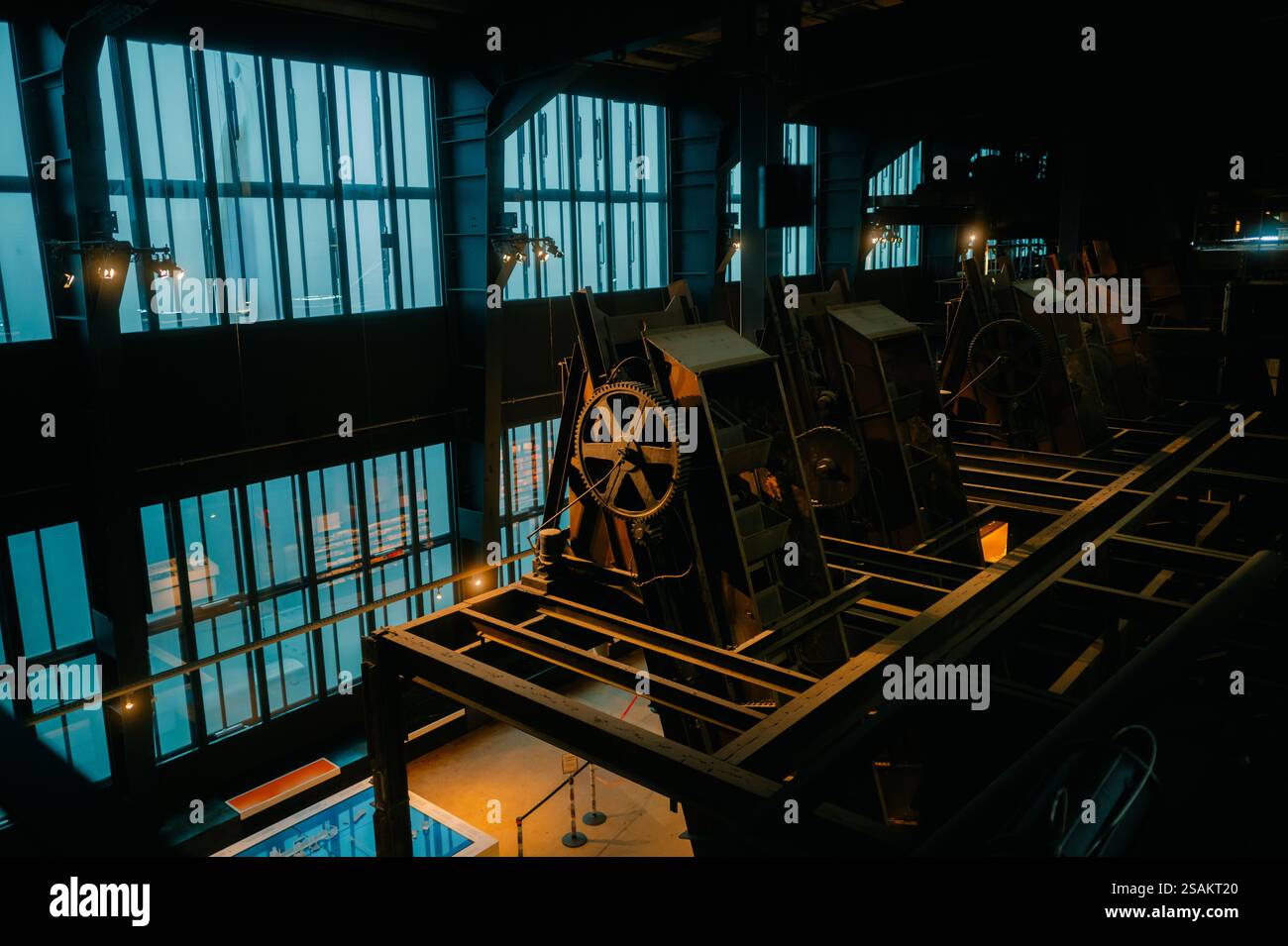 Interior of the industrial complex with massive machinery and tall ...