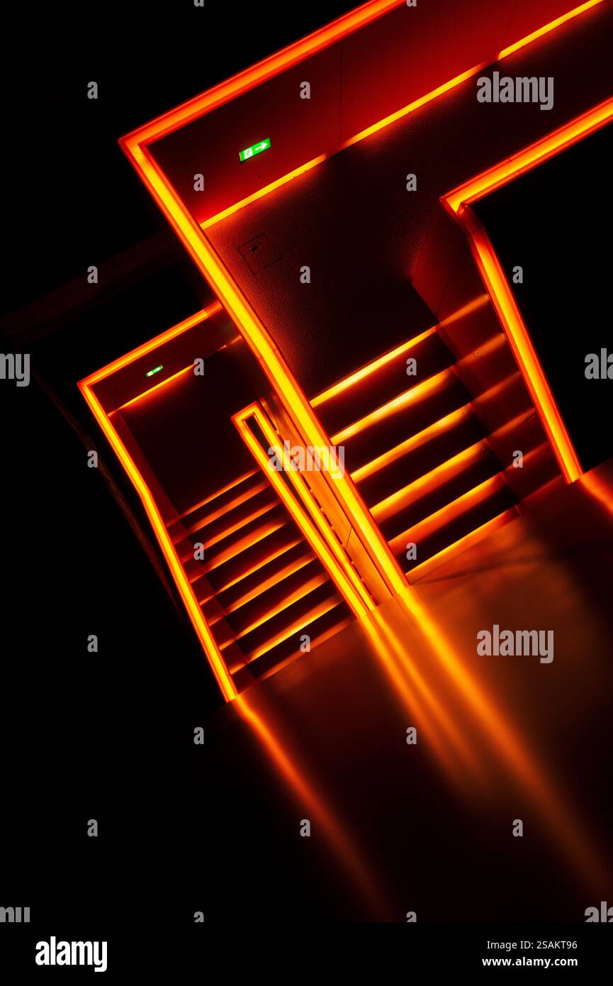 Abstract glowing neon stairs in red light, featuring clean lines ...