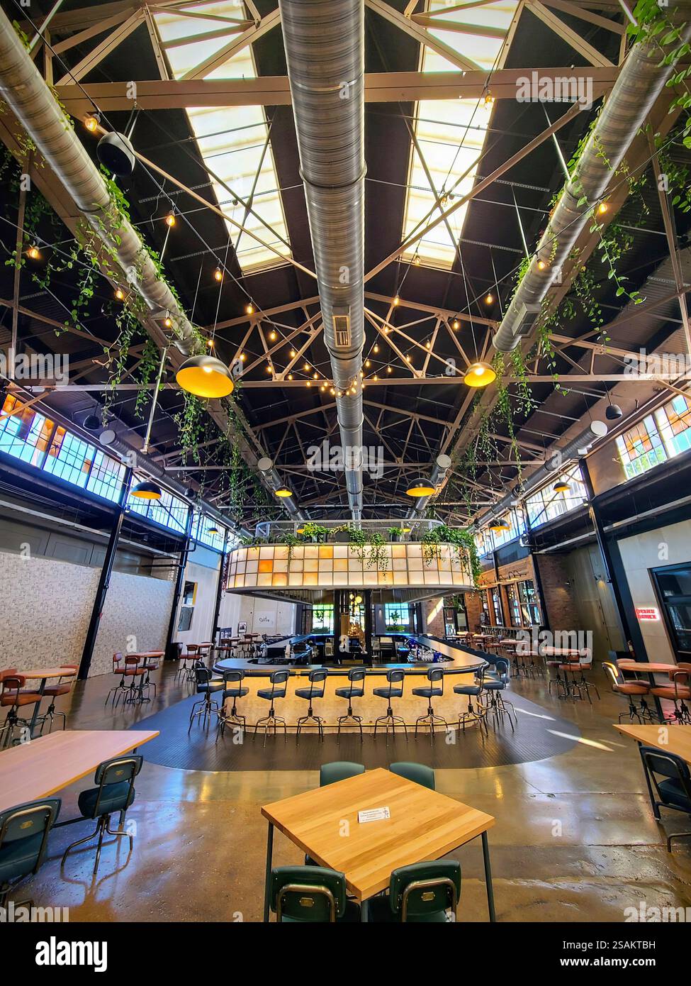 Industrial Urban Cafe with Greenery and Bar, Eye-Level View Stock Photo ...
