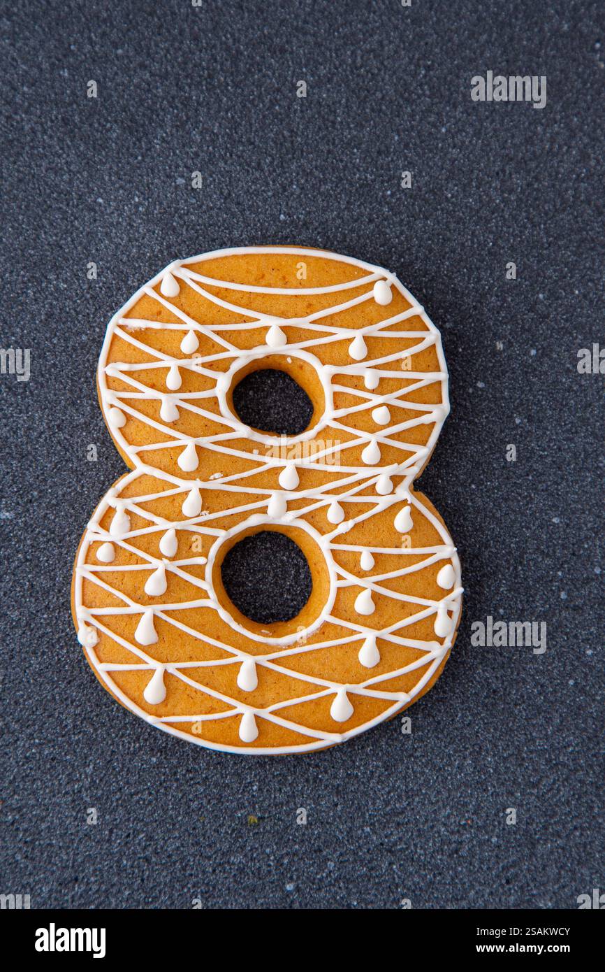 Decorative Gingerbread Number Eight. Black background Stock Photo - Alamy