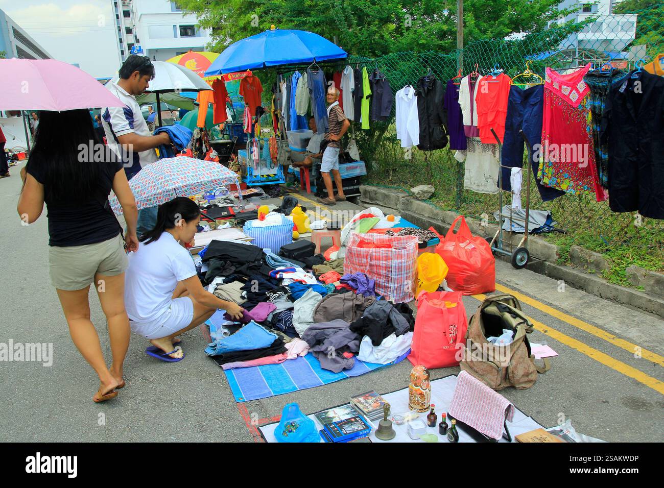 Used clothes in good condition for sale at a flea market Stock Photo ...