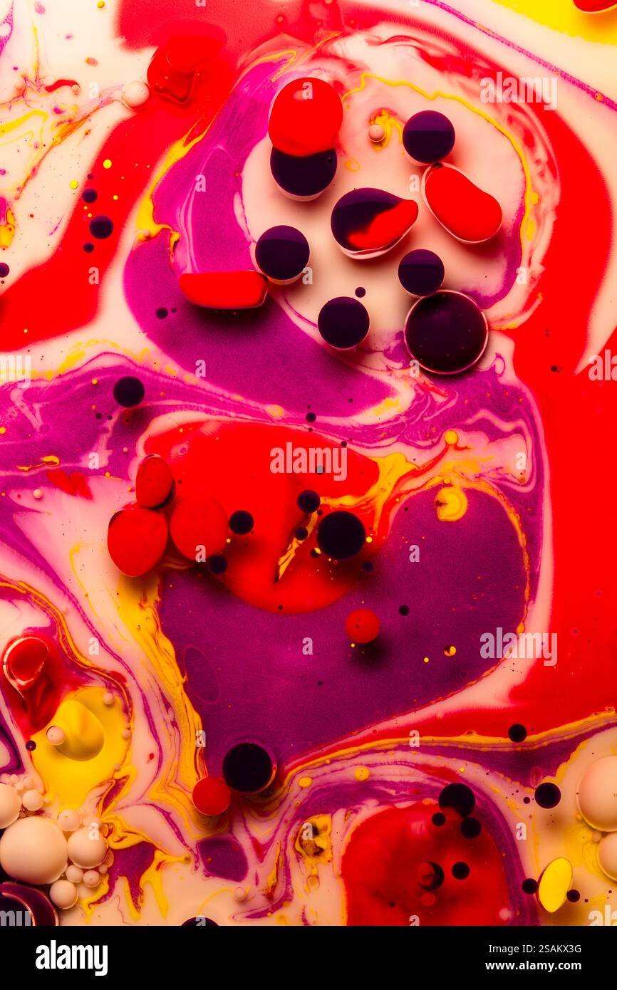 Stunning creative macro abstract still-life of colour infused milk and ...