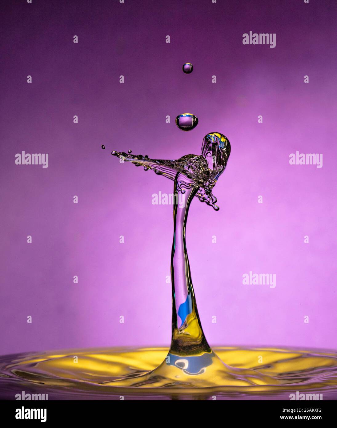 Arresting, ethereal, colour infused, imaginative water collision, macro ...