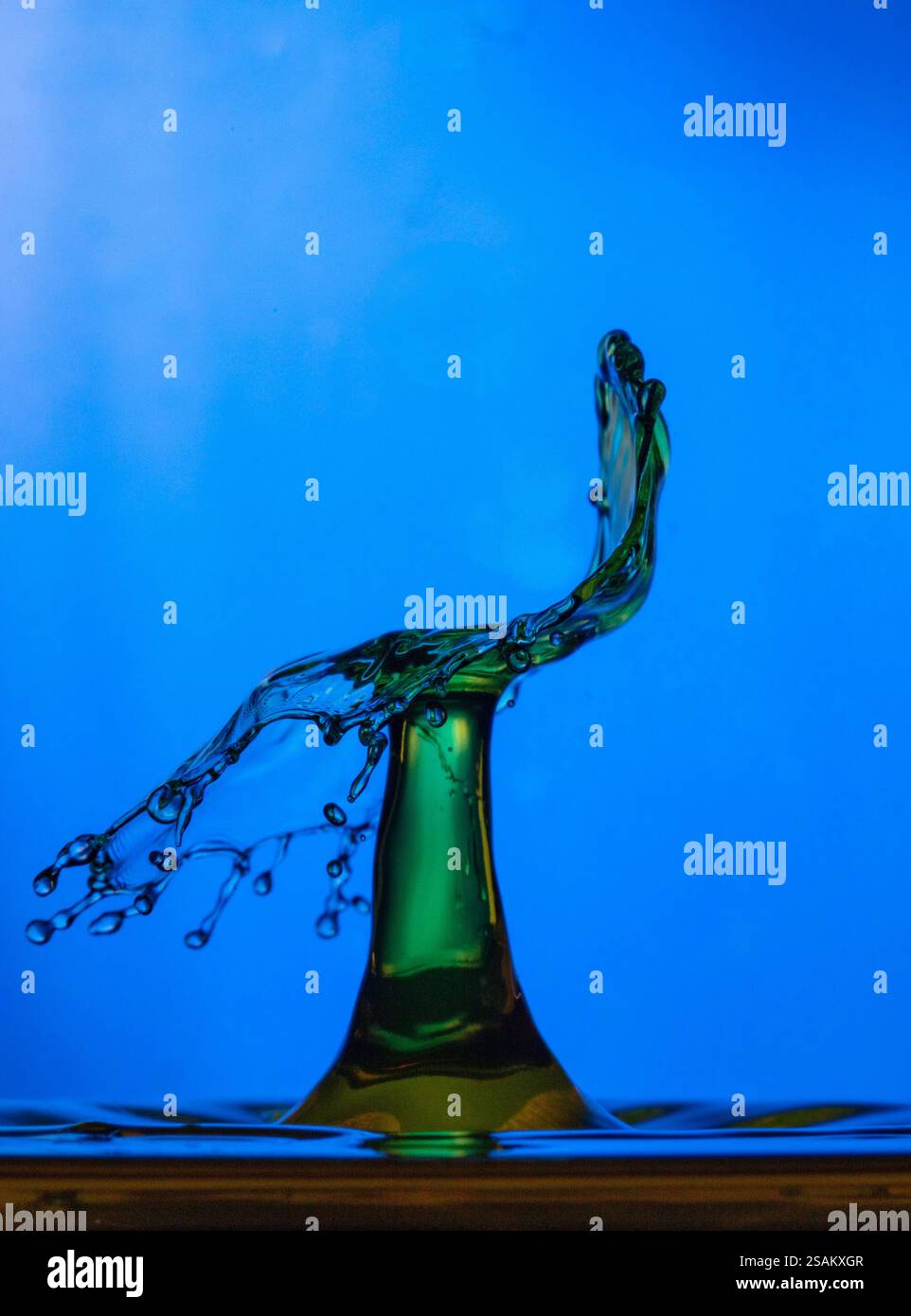 Arresting, ethereal, colour infused, imaginative water collision, macro ...