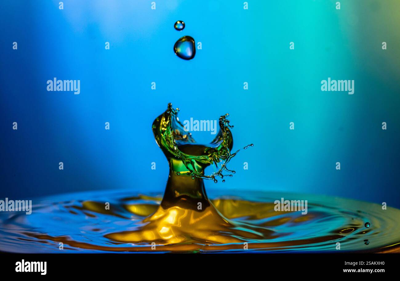 Arresting, ethereal, colour infused, imaginative water collision, macro ...