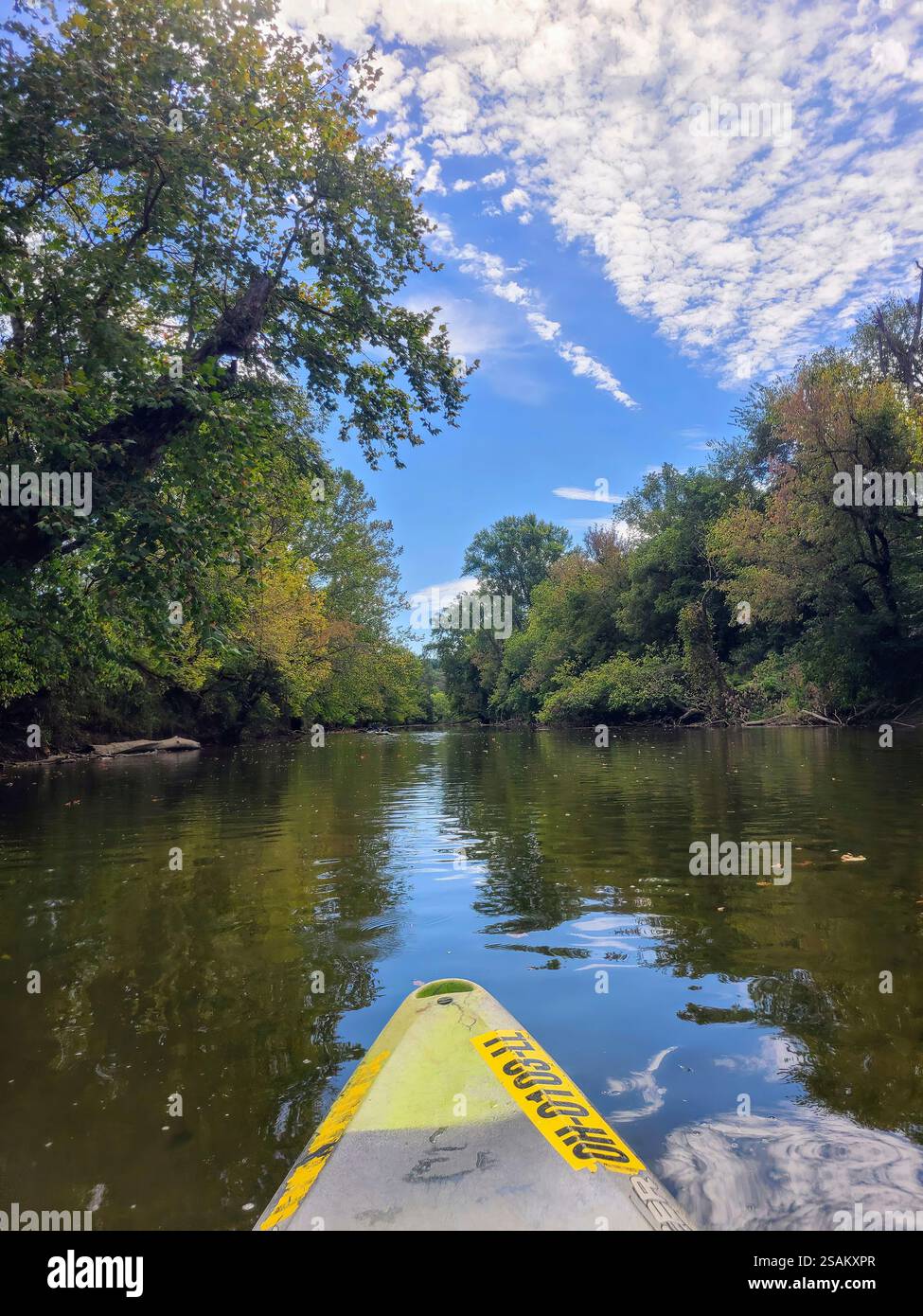 Kayaking Through Lush Greenery on a Calm River in Hocking Hills ...