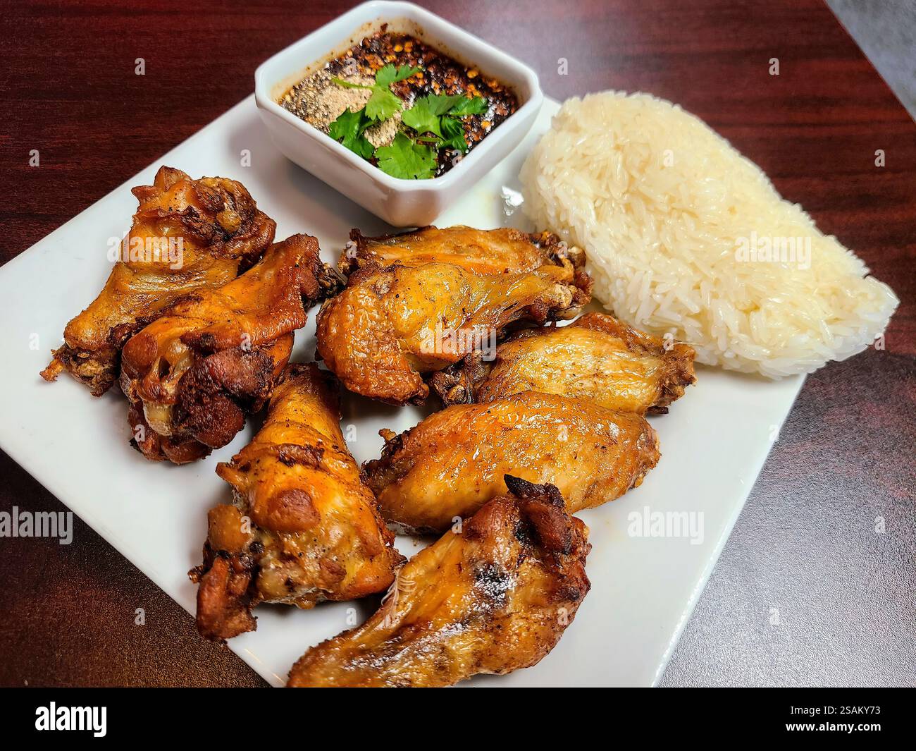 Crispy Thai Chicken Wings with Sticky Rice and Dipping Sauce Eye Level ...