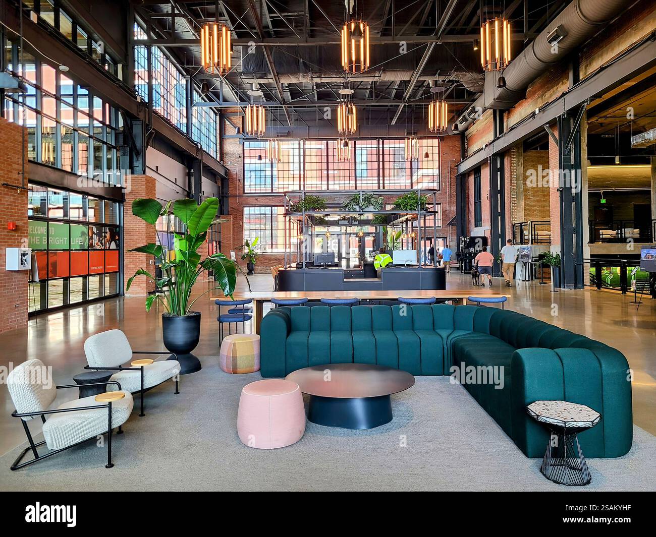 Modern Coworking Space with Green Sofa and Industrial Design at Eye ...