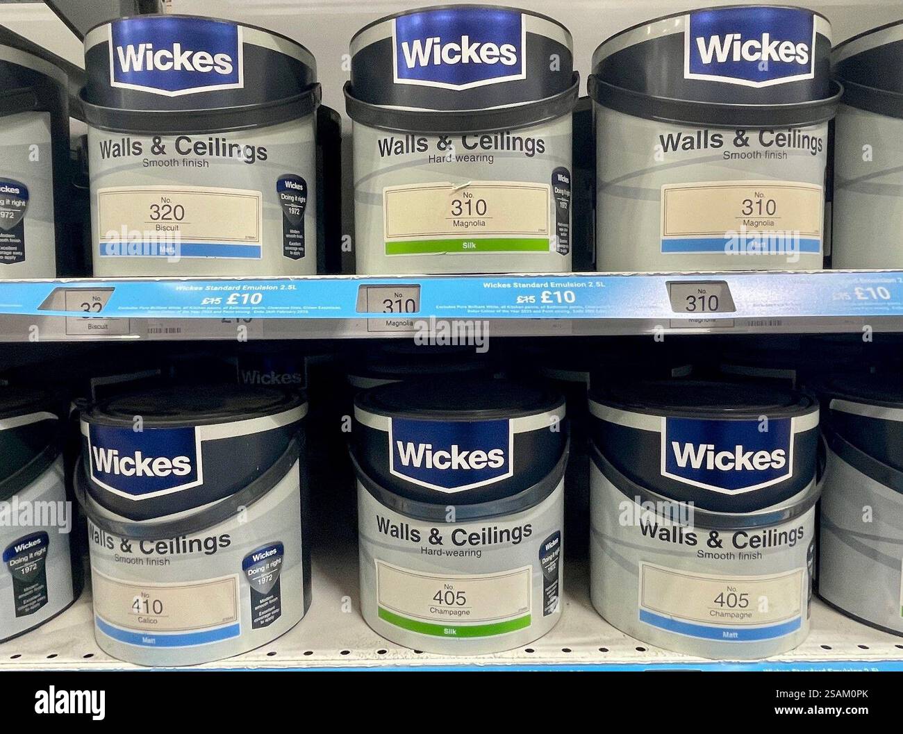 A general view of shelves with paint on display, inside Wickes store at ...