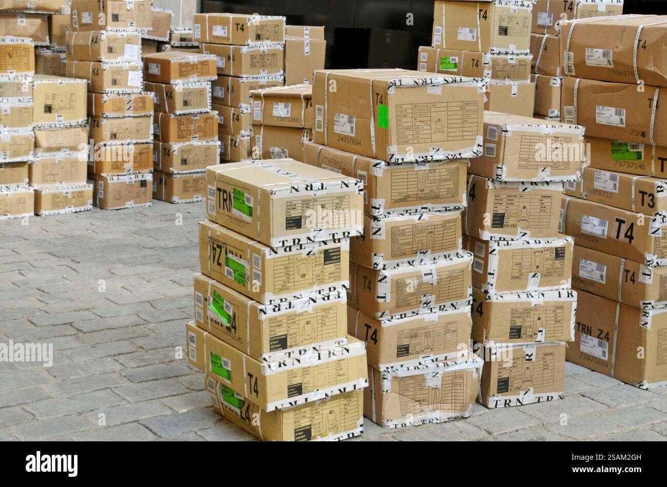 cardboard boxes on the street outside a warehouse Stock Photo - Alamy