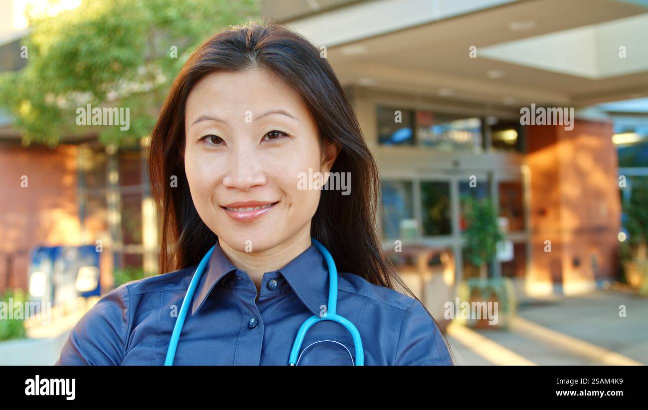 Portrait Of Female Doctor With Stethoscope At Work Standing Outside ...