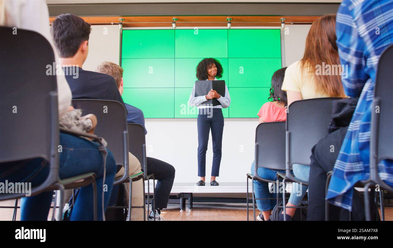 Female Teacher Giving Presentation To High School Or University Class ...