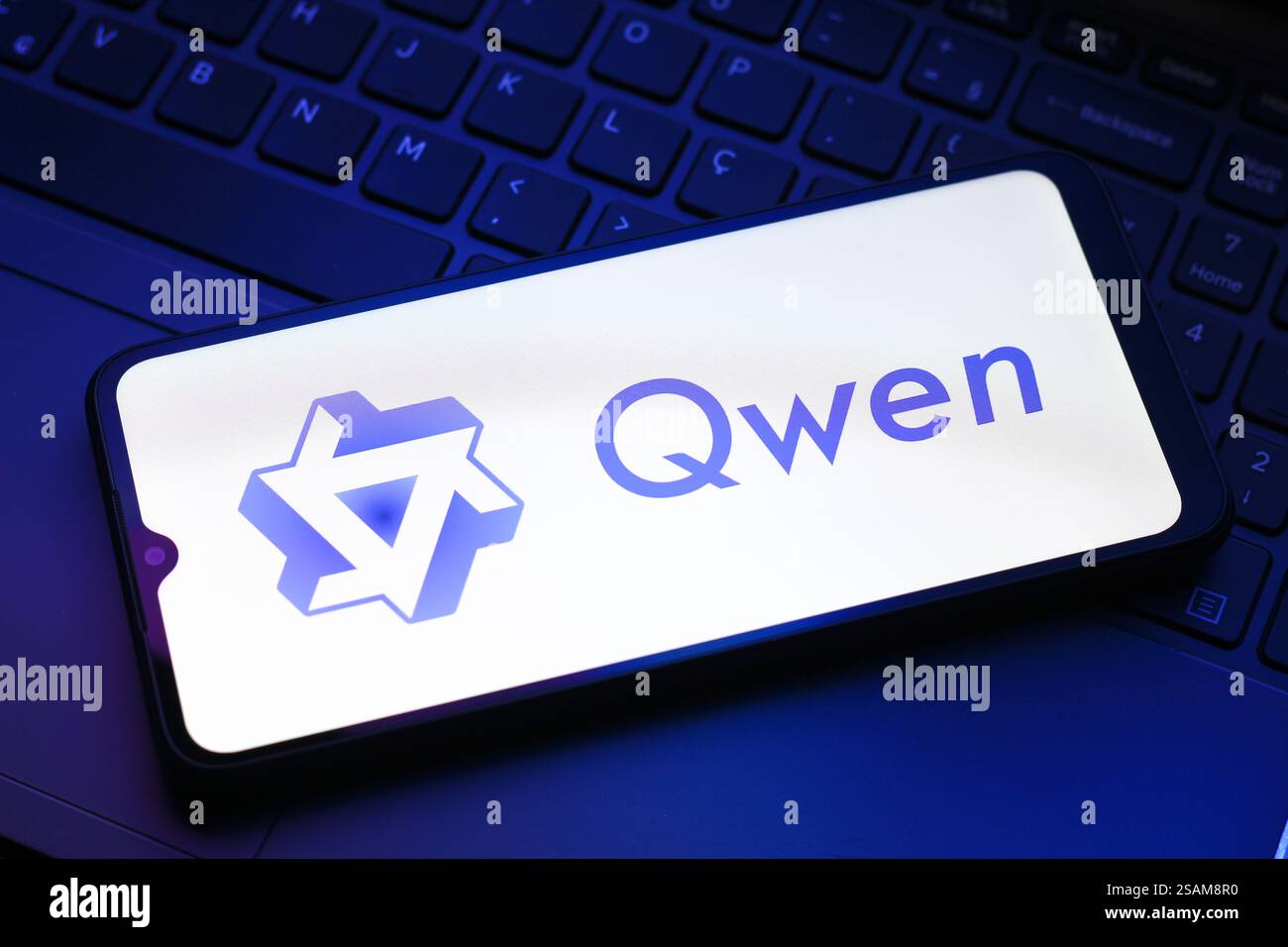In this photo illustration, the Qwen (Alibaba) logo is seen displayed ...