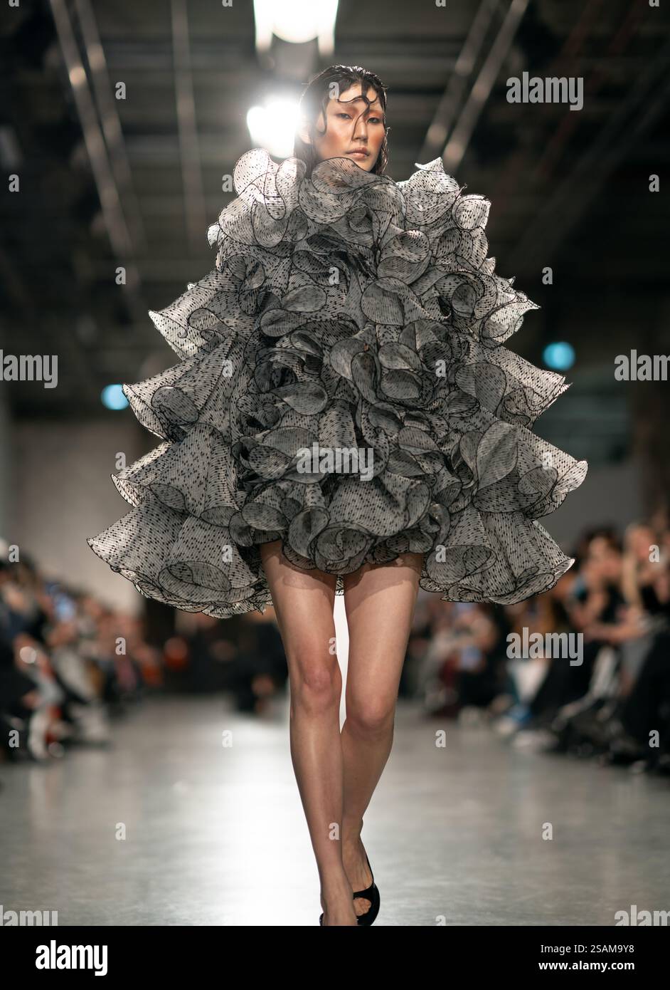 PARIS, FRANCE - JANUARY 30 A model walks the runway during the Juana ...